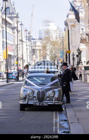 Wedding cars outside the The Royal Automobile Club situated on Pall ...