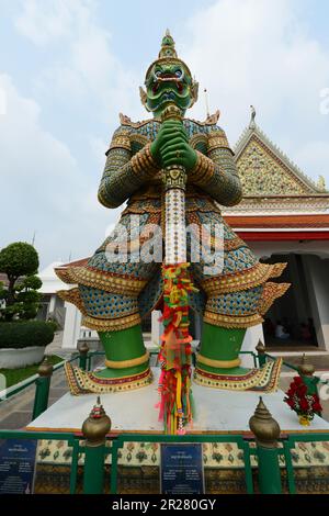 The sculptures of two mythical giant demons, Thotsakan and Sahatsadecha ...