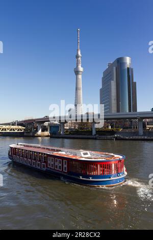 Skytree, a water bus and Sumida River Stock Photo - Alamy