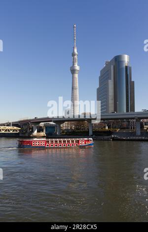 Skytree, a water bus and Sumida River Stock Photo - Alamy