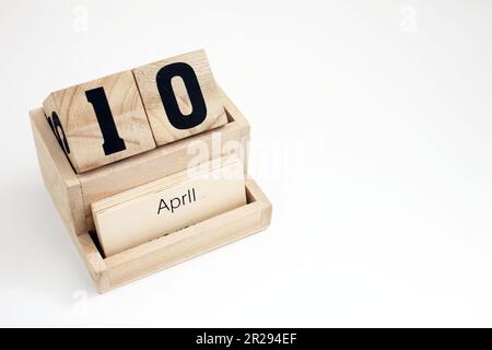 Wooden perpetual calendar showing the 10th of May Stock Photo - Alamy
