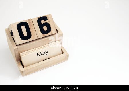 Wooden perpetual calendar showing the 6th of July Stock Photo - Alamy