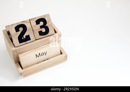 Wooden perpetual calendar showing the 23rd of August Stock Photo - Alamy