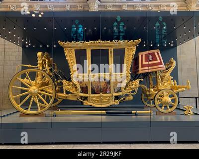 The Gold State Coach on display at the Royal Mews in Buckingham Palace ...