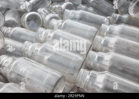 Used empty glass bottles stored for recycling, selective focus Stock ...