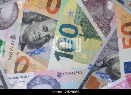 currency exchange: several Ukrainian hrivnya banknotes against euro ...