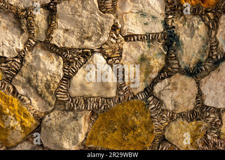 Merida, Yucatan, Mexico, Large wall with a drawing of people on it. The ...