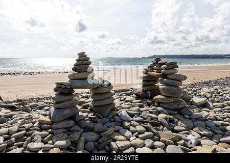 Rock Cairns, Amroth, Wales Cairns are man-made rock piles that are used ...