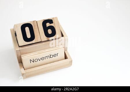 Wooden perpetual calendar showing the 6th of July Stock Photo - Alamy