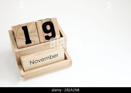 Wooden perpetual calendar showing the 19th of September Stock Photo - Alamy