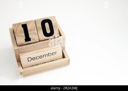 Wooden perpetual calendar showing the 10th of May Stock Photo - Alamy