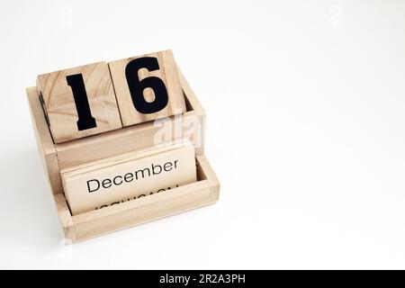 Wooden perpetual calendar showing the 16th of September Stock Photo - Alamy