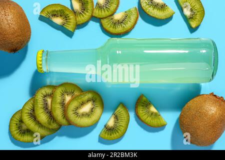 Composition with bottle of fresh soda on grey background Stock Photo ...