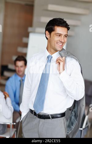 Motivated male leader standing over international group of protestors ...