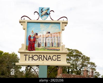 The Thornage village sign, Norfolk, UK Stock Photo - Alamy