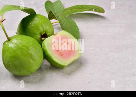 Pink guava fruits isolated on white background.Guava fruit with leaf ...