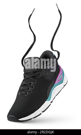 White sneaker with flying laces stands on the tip isolated on white ...