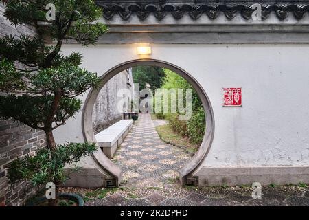 round gate Kowloon Walled City Park in Hong Kong Stock Photo - Alamy