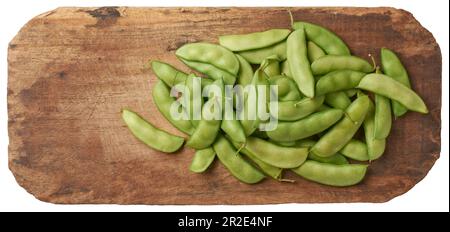 pile of pea pods, type of legume that is widely cultivated for its ...