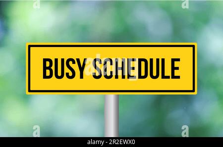 Busy schedule road sign on blue sky background Stock Photo - Alamy