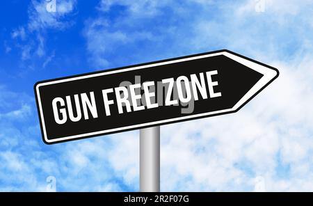 Gun free zone road sign on blur background Stock Photo - Alamy