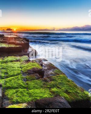 Sunrise at Tessalated Pavement at Eagle Hawk Neck, Tasmania Stock Photo ...