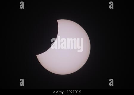 Partial solar eclipse against black sky Stock Photo - Alamy