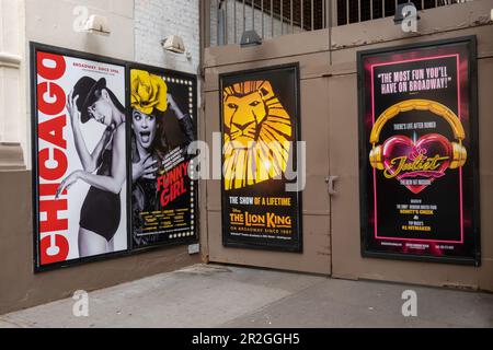 A grouping of Broadway show posters in the theater district near Time ...