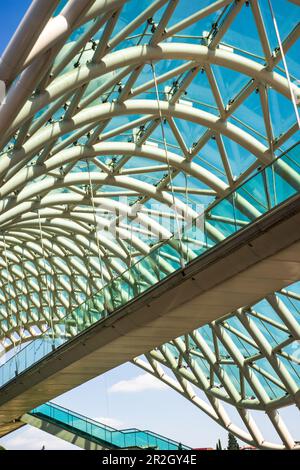 Tbilisi's downtown and glass bridge of Peace Stock Photo - Alamy