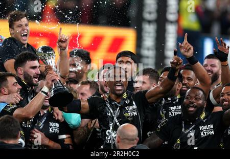 Toulon's Jiuta Wainiqolo holds the trophy with team-mates as they ...