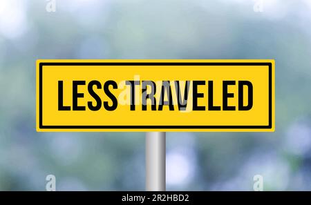 Less traveled road sign on blue sky background Stock Photo - Alamy