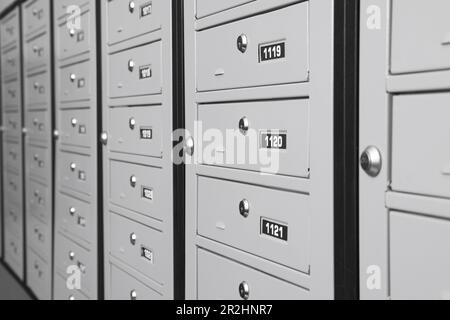 Closed metal mailboxes with keyholes and sequence numbers indoors Stock ...