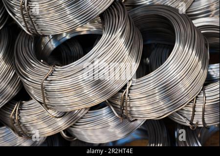 Skeins of lead rod material for shells manufactured at plant Stock ...