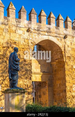 Statue of Seneca with the Almodovar Gate and Walls of Cordoba built in ...