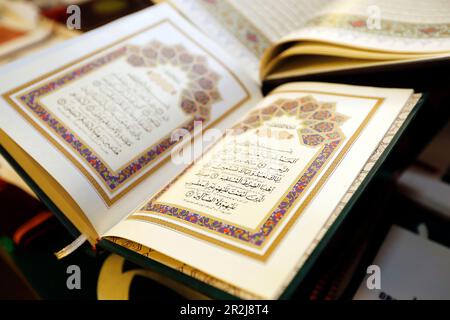 Open Holy Quran in arabic Stock Photo - Alamy