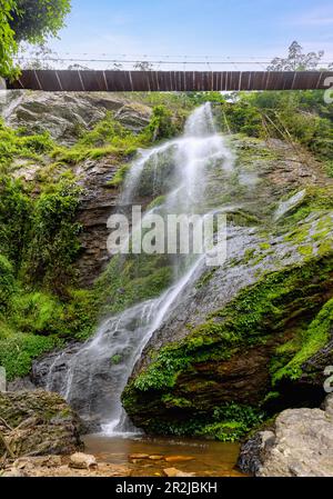 Ote Waterfall and suspension bridge in the Avatime Mountains landscape ...