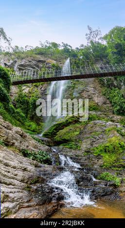Ote Waterfall and suspension bridge in the Avatime Mountains landscape ...