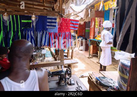 Tailoring of traditional Dagomba smocks at the Central Market in Tamale ...