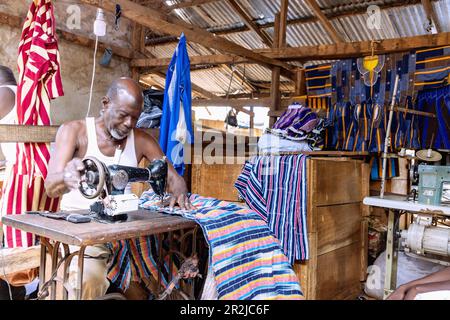 Tailoring of traditional Dagomba smocks at the Central Market in Tamale ...