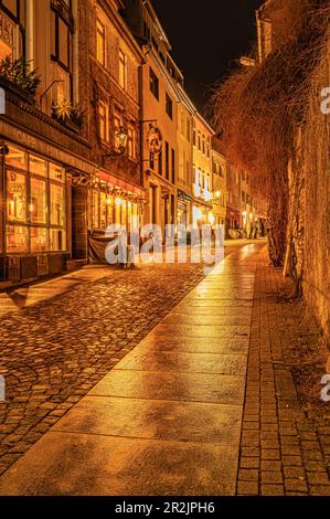Night shot of the Wagnergasse in Jena with its various restaurants and ...