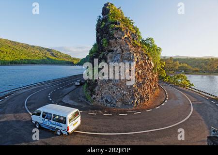 Hair-pin bend around a rock in Baie du Cap,Maconde view point. Coastal ...