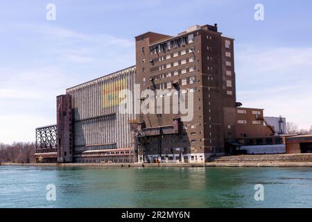 The historic grain mill located along the Welland Canal in the town of ...