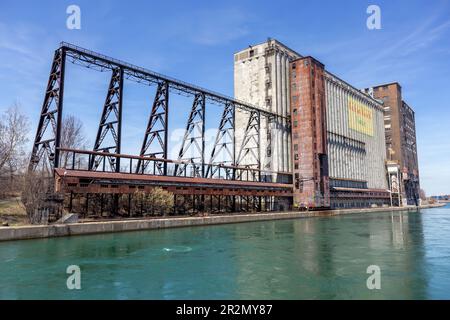The historic grain mill located along the Welland Canal in the town of ...