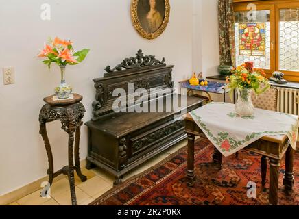 Bay window in corridor, corridor, leaded glass window, sofa, table ...