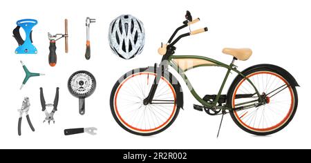 Modern bicycle, its details and tools for repair on white background ...