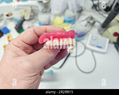 Wax dentures model table of dental technician workplace Stock Photo - Alamy