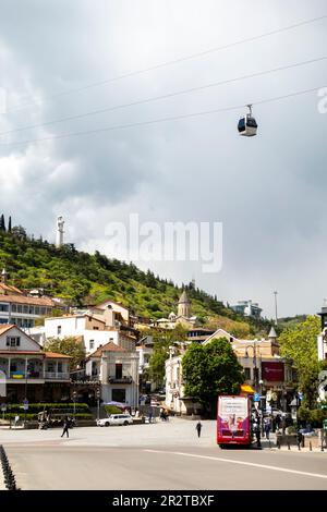 Tbilisi aerial tramway on cable above city and the Mtkvari -Kura River ...
