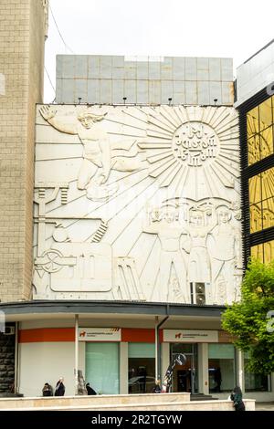 Tbilisi Soviet street artworks. Sculptural bas-relief depicting ...