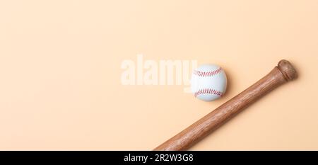 Baseball bat and ball on beige background. Horizontal sport theme ...