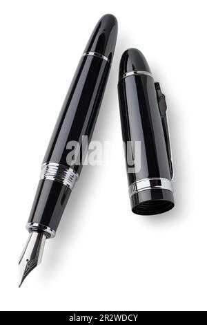 Retro style fountain pen, black with golden trim, isolated on white ...